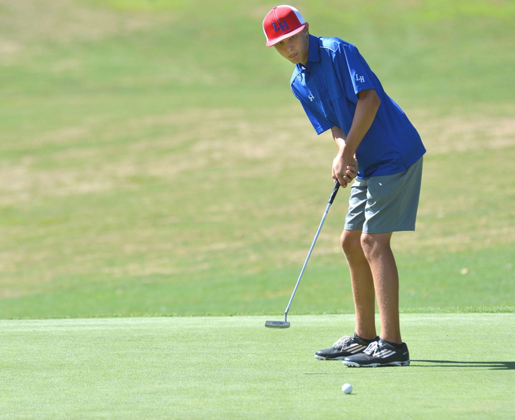Ek wins county golf title - Herald-Standard